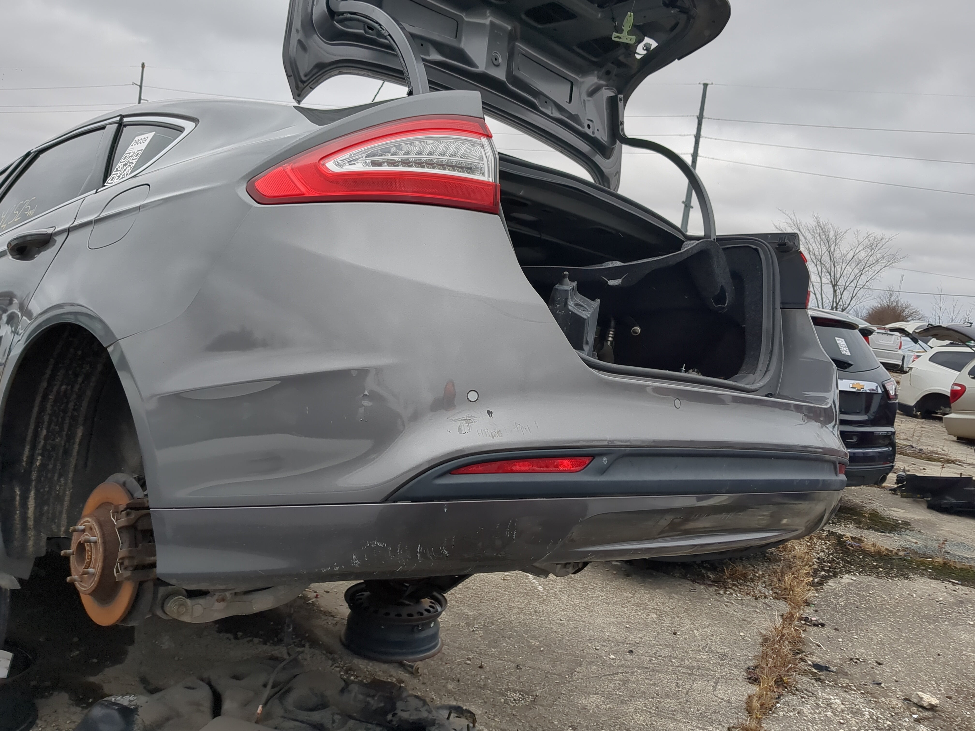 2013-2018 Ford Fusion Rear Bumper Assembly Oem – Oemusedautoparts1.com